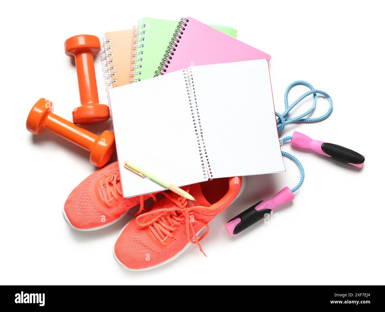Composition with blank notebook, sports equipment and shoes on white ...
