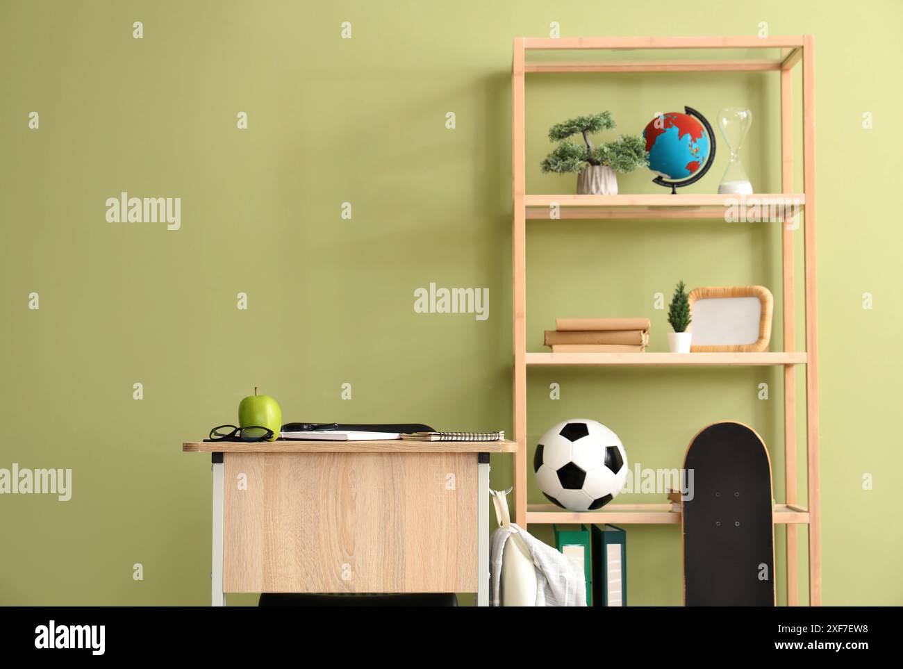 Interior of classroom with desk and shelf unit Stock Photo - Alamy