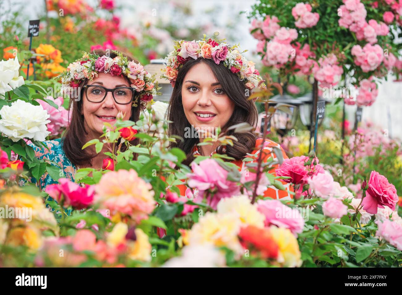 London, UK. 01st July, 2024. Two ladies with Harkness Roses pose with a ...