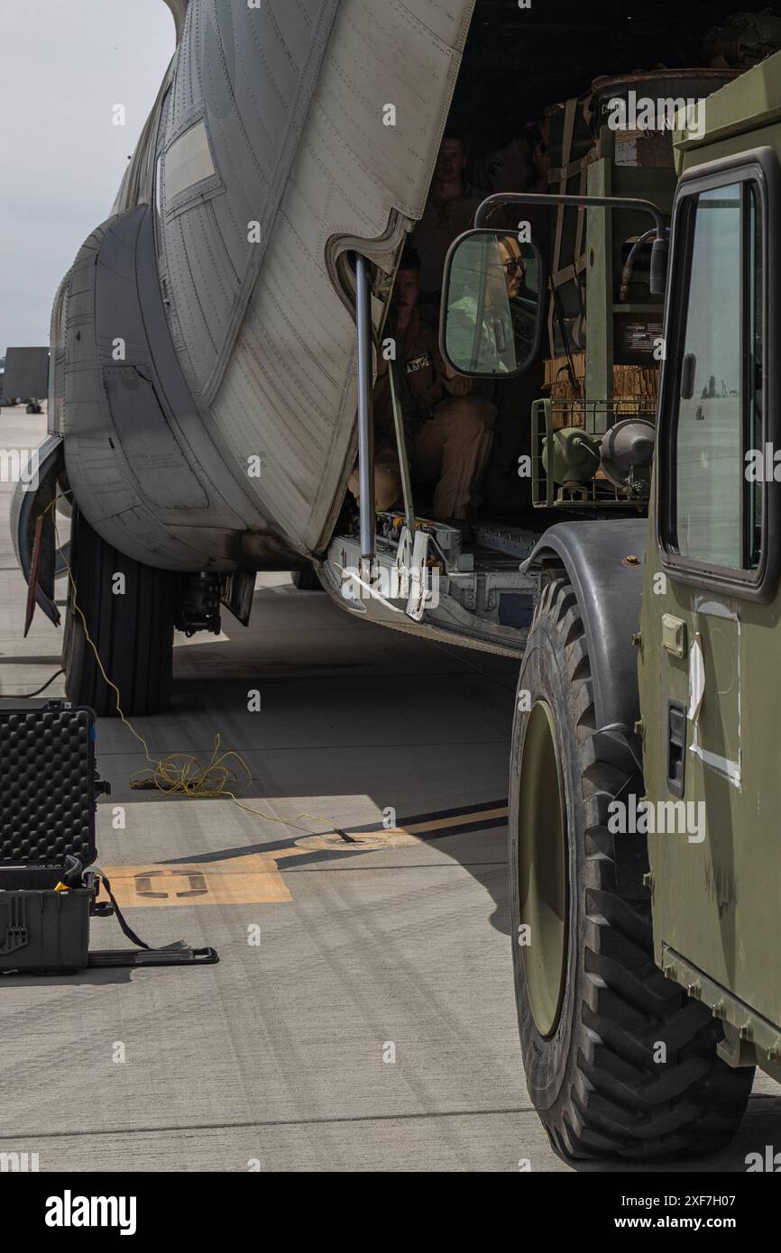 U.S. Marine Corps Lance Cpl. William Chung, an equipment operator with ...