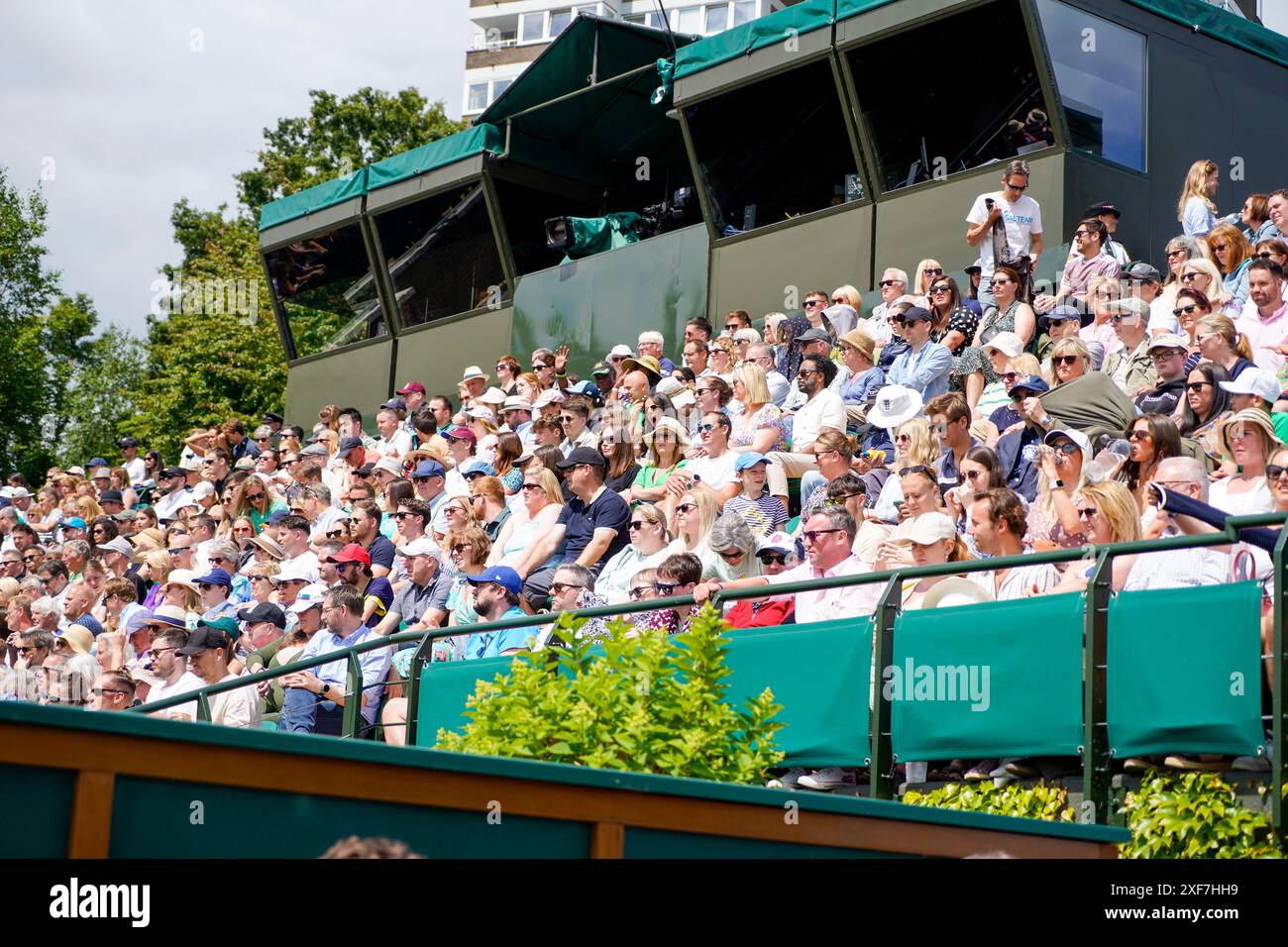 Crowds of people on Court 18 enjoying tennis on day 1 of the ...