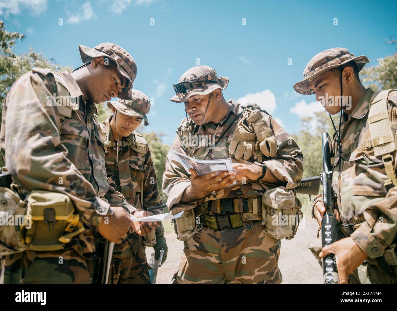 Royal Tongan marines assigned to His Majesty's Armed Forces read a ...