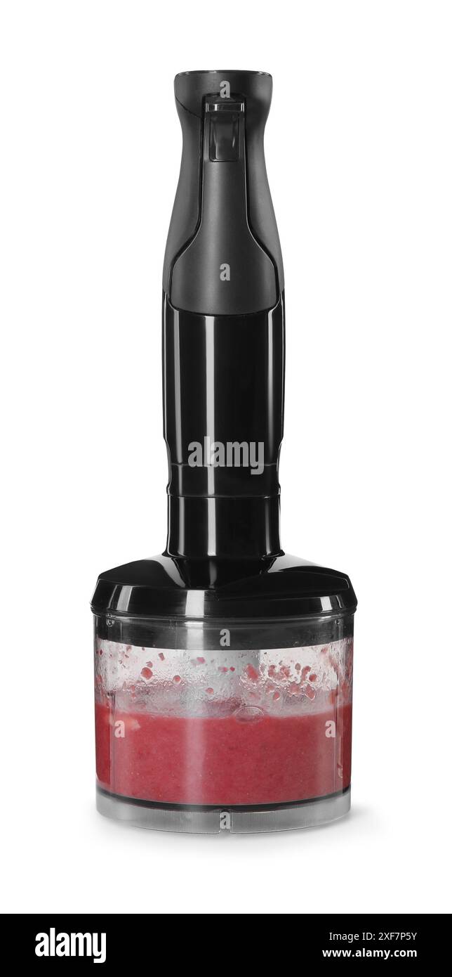 Hand blender with mixture of ingredients isolated on white Stock Photo ...