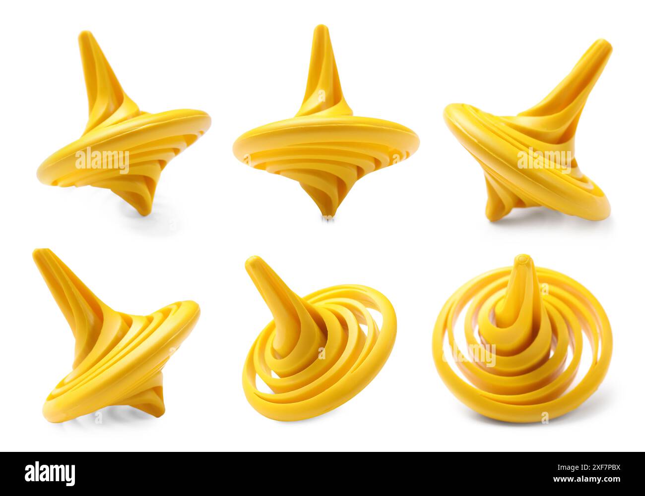 Yellow spinning top isolated on white, collage Stock Photo - Alamy