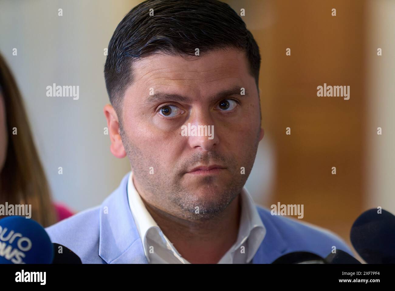 Bucharest, Romania. 1st July, 2024: Adrian Cozma, PNL Vice President Youth and Sports, speaks to ...