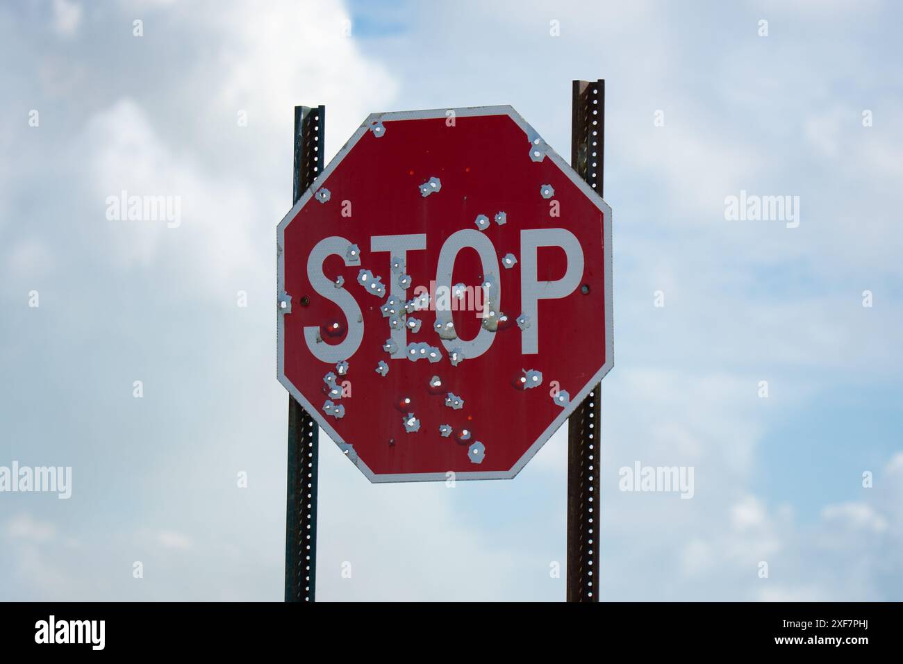Stop Sign with bullet holes Stock Photo - Alamy