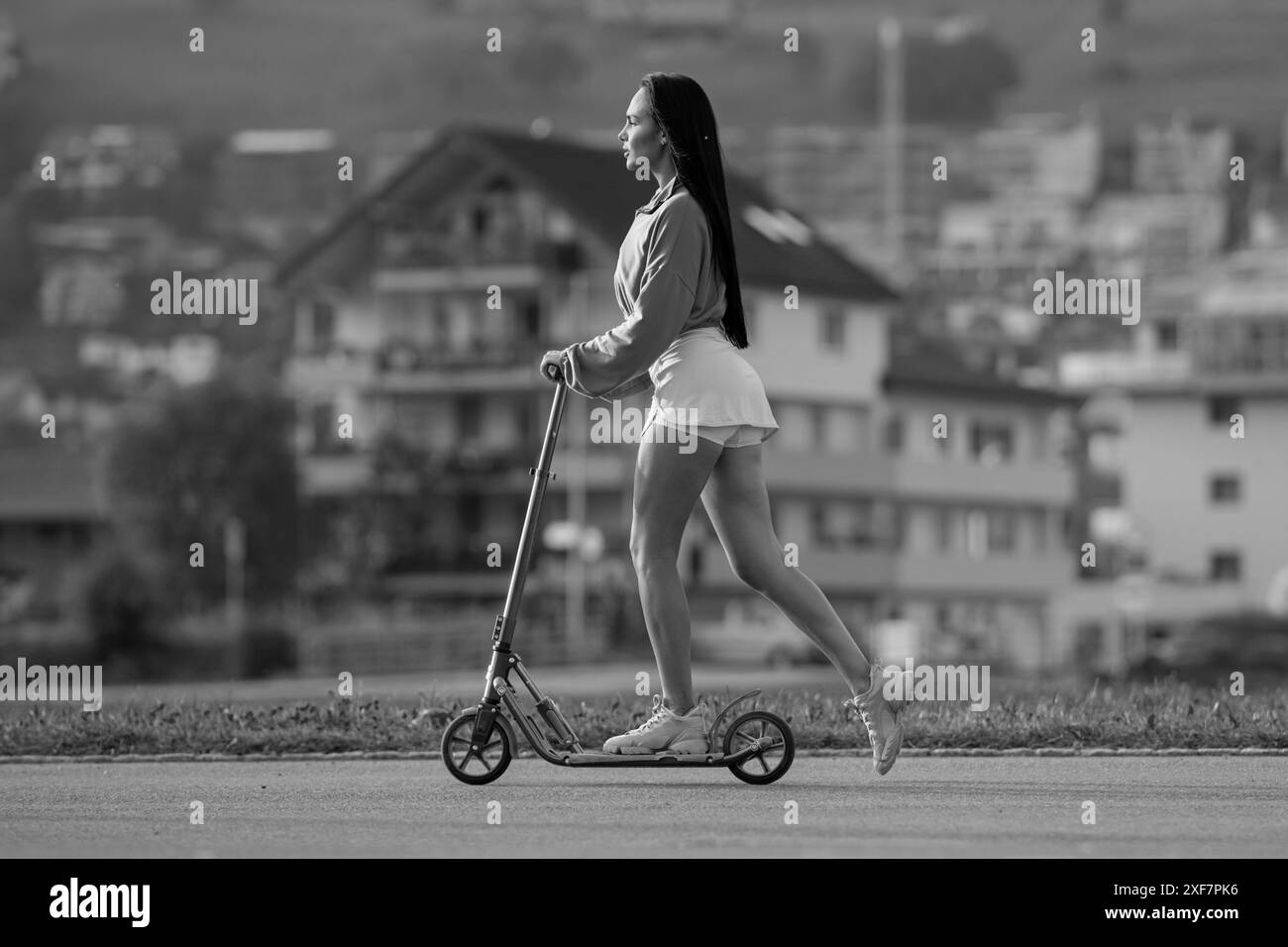 Freedom And Carefree Cool Young Girl Standing On Funny Scooter Girl Riding Scooter A Girl