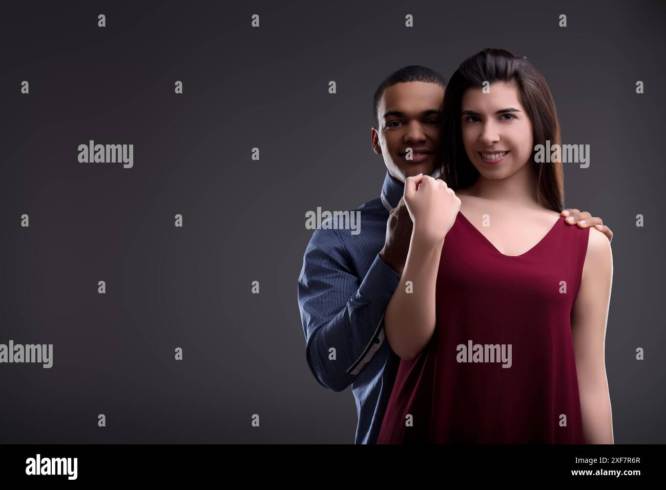 Interracial couple stands together hi-res stock photography and images - Alamy