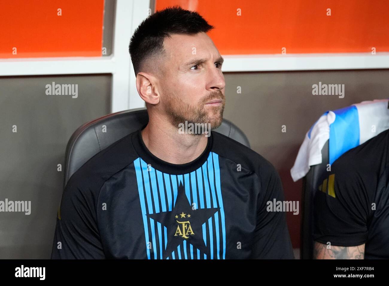 Argentina forward Lionel Messi sits on the bench before a Group A Copa ...