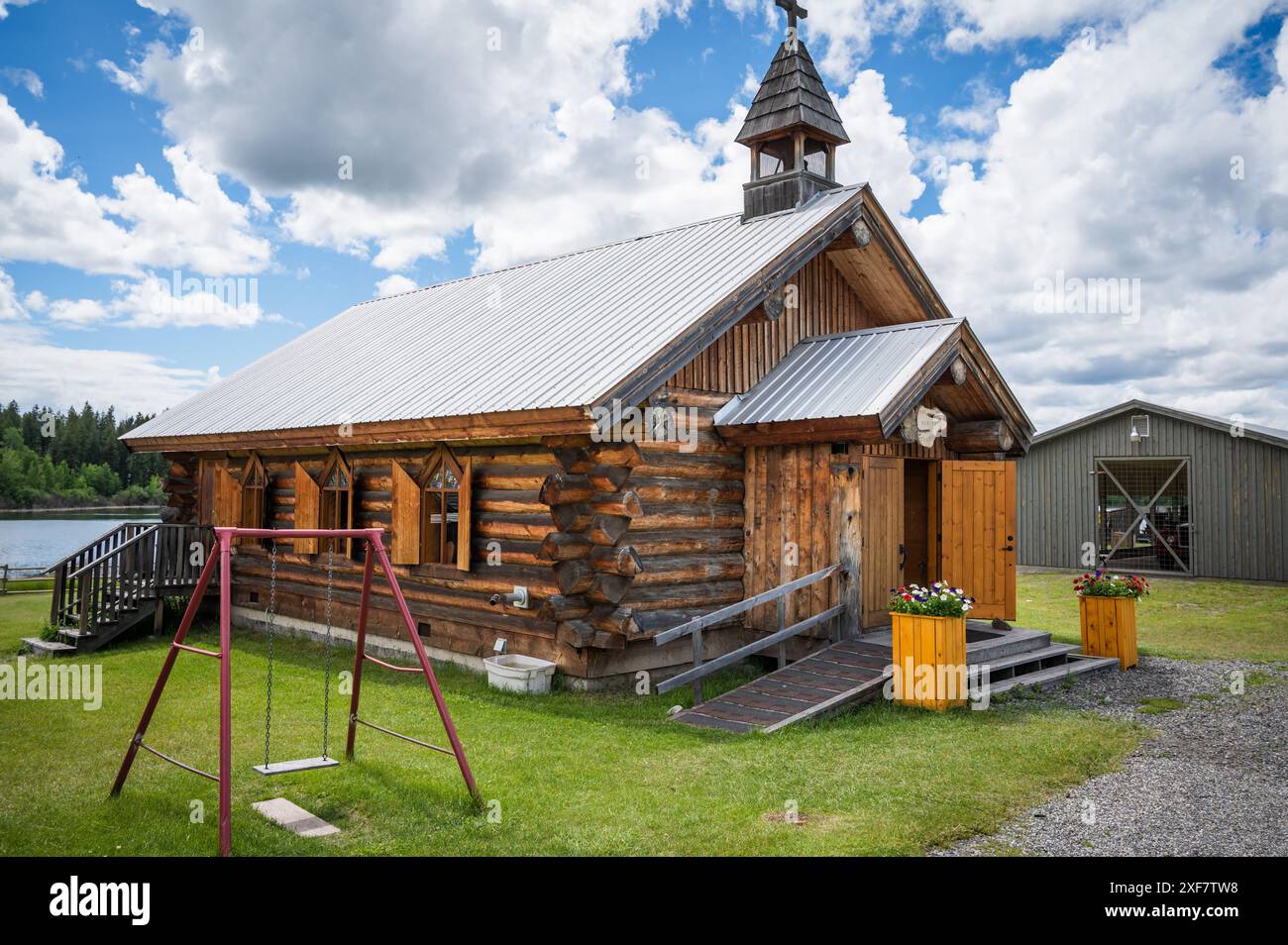 Old log built church. Old buildings and log cabins at the 108 Mile ...