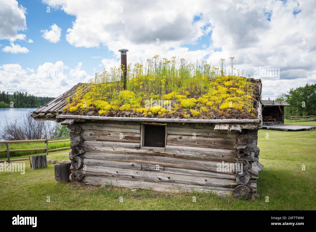 Old log built sod roof hut. Old buildings and log cabins at the 108 ...