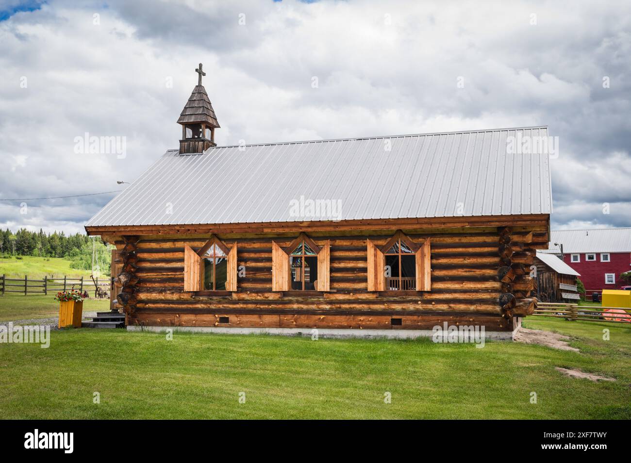 Old log built church. Old buildings and log cabins at the 108 Mile ...