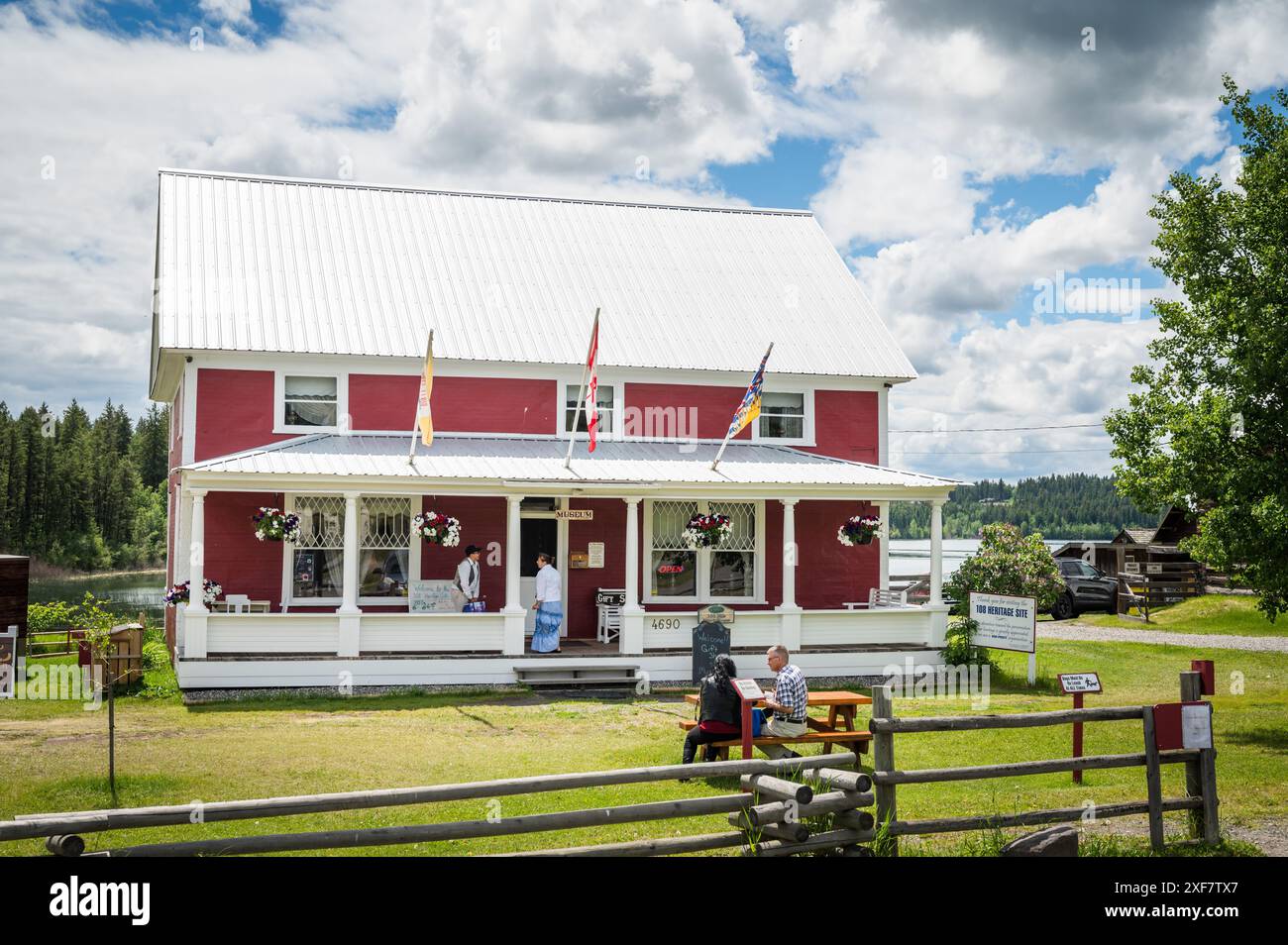 Old building and log cabins at the 108 Mile House Heritage Site. 108 ...