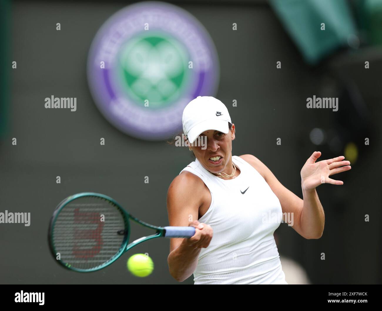 London, Britain. 1st July, 2024. Madison Keys hits a return during the ...