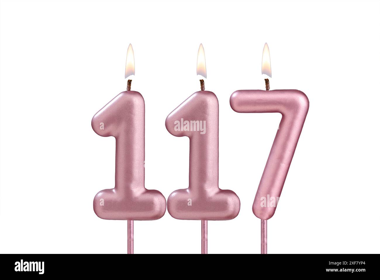Candle number 117 - Lit birthday candle on white background Stock Photo ...
