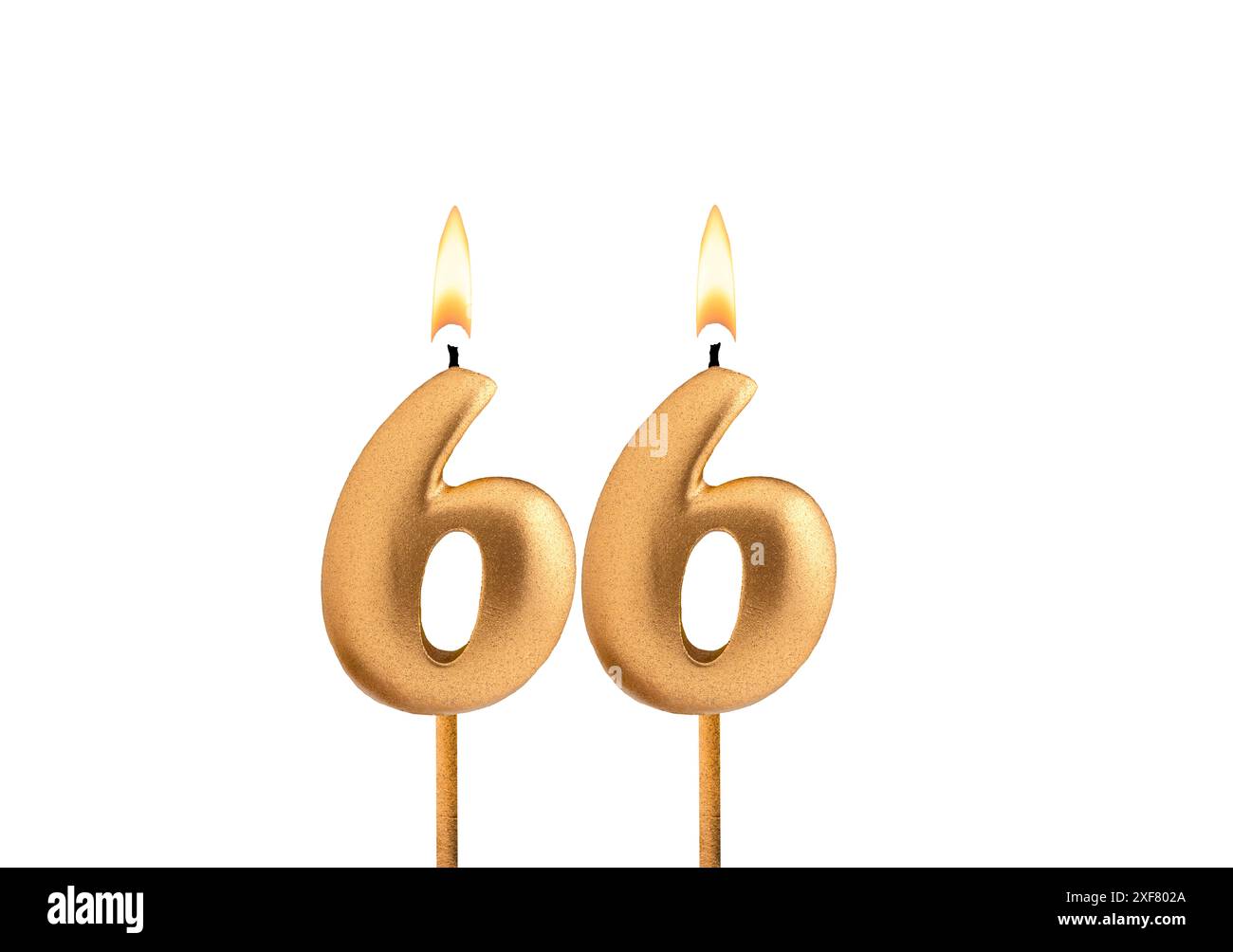 Birthday number 66 - Golden candle on white background Stock Photo - Alamy
