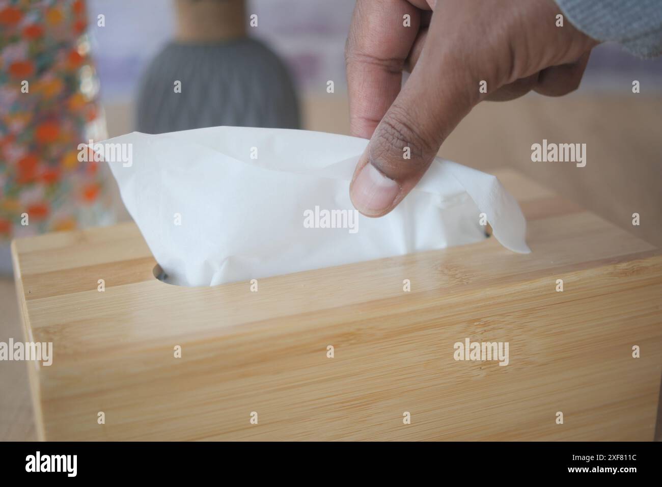 Pulling a tissue from a box hi-res stock photography and images - Alamy