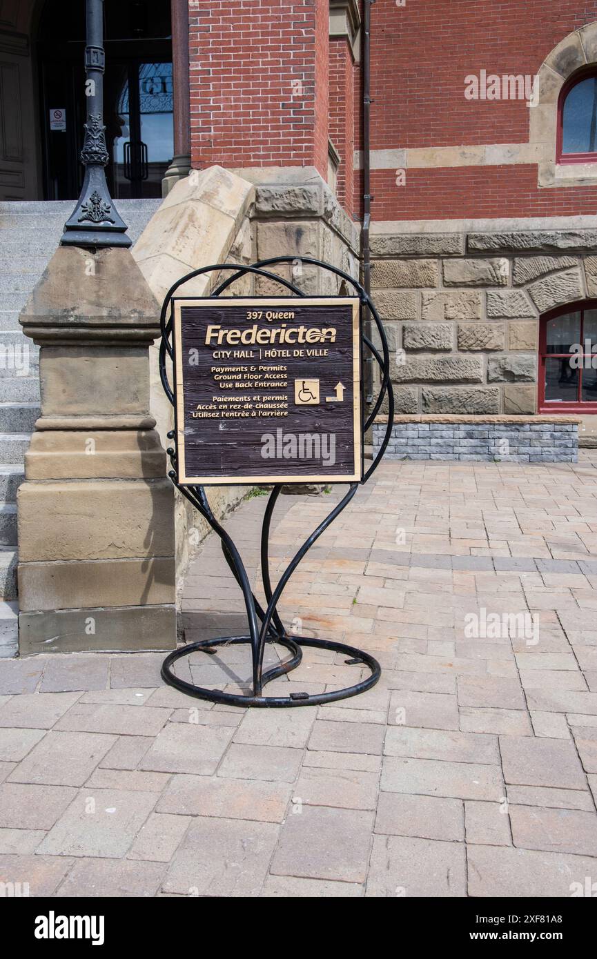 City hall sign on Queen Street in downtown Fredericton, New Brunswick ...