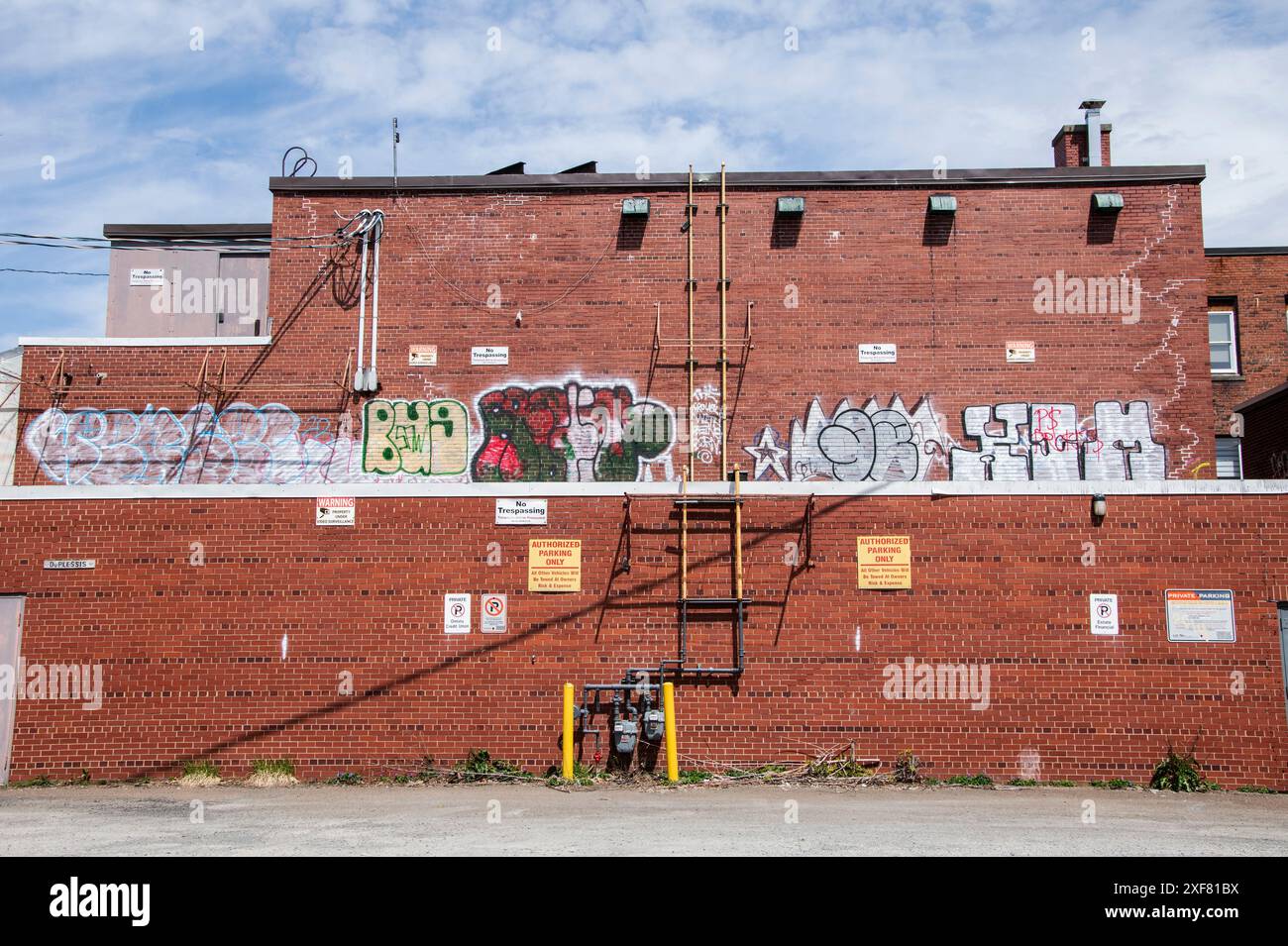 Graffiti tagged on a building in downtown Fredericton, New Brunswick ...