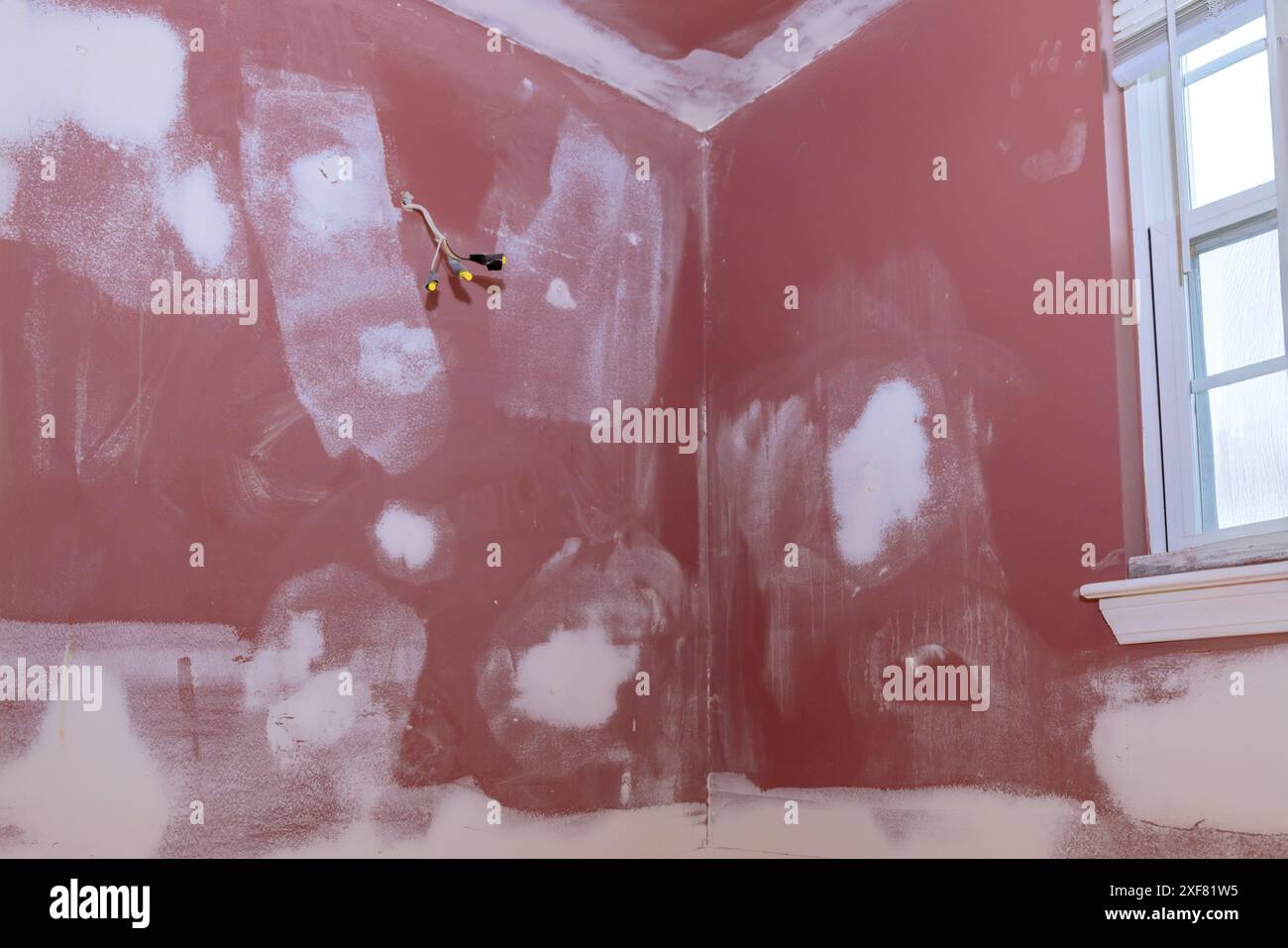 Pinning of damaged walls during repair of rooms in house Stock Photo ...