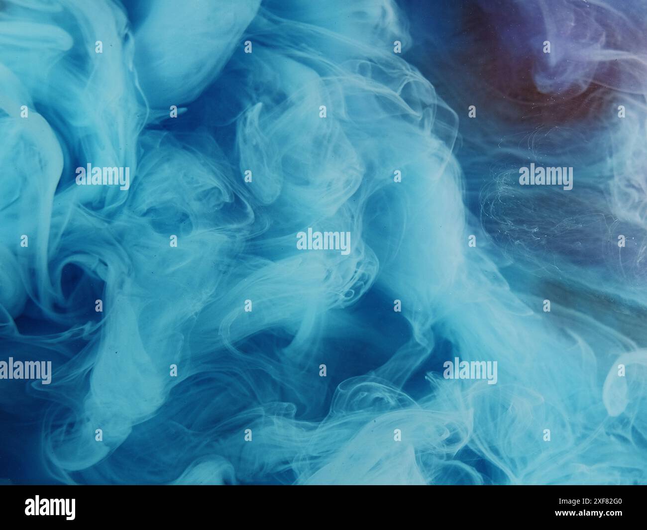 Twisted steam. Colorful smoke cloud. Glitter blue purple mist ink on ...