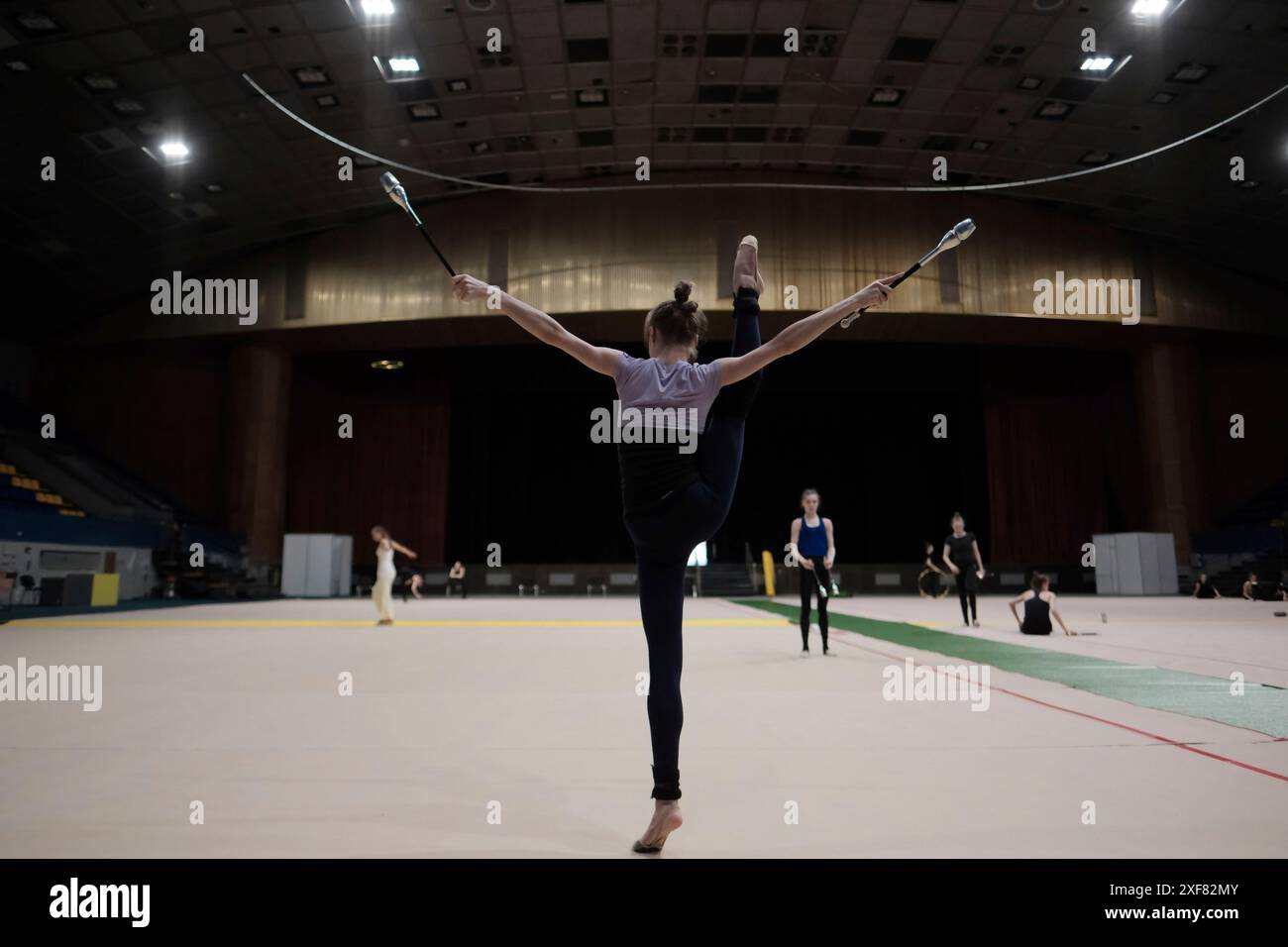 The Ukrainian rhythmic gymnastics team members practice ahead of the ...