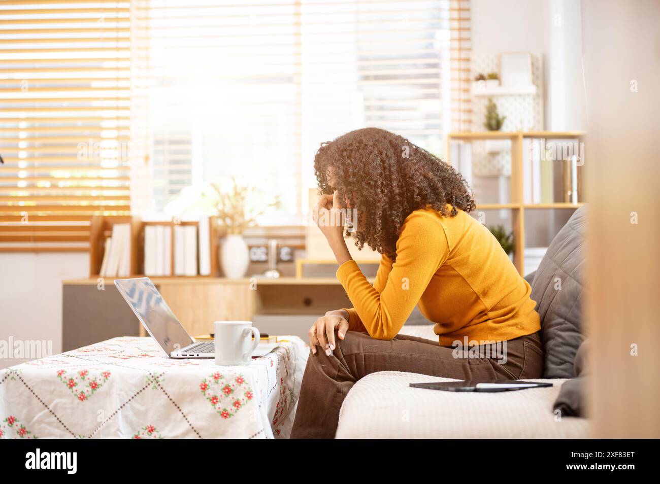 Young black woman tired from studying hi-res stock photography and ...