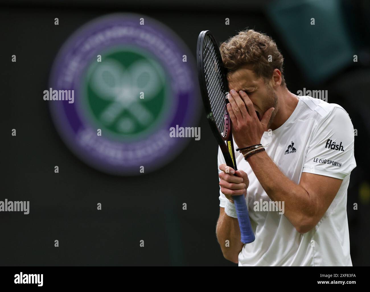 London, Britain. 1st July, 2024. Yannick Hanfmann reacts during the men ...