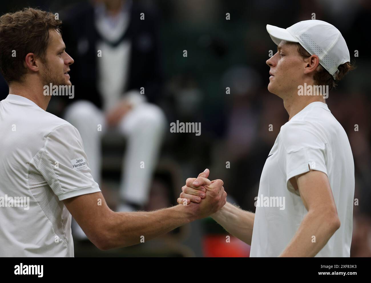 London, Britain. 1st July, 2024. Jannik Sinner (R) of Italy greets ...