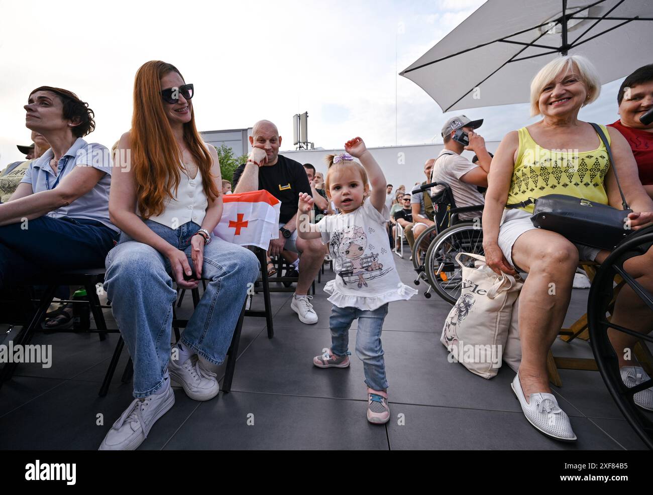 Non Exclusive: LVIV, UKRAINE - JUNE 28, 2024 - A little girl dances in ...