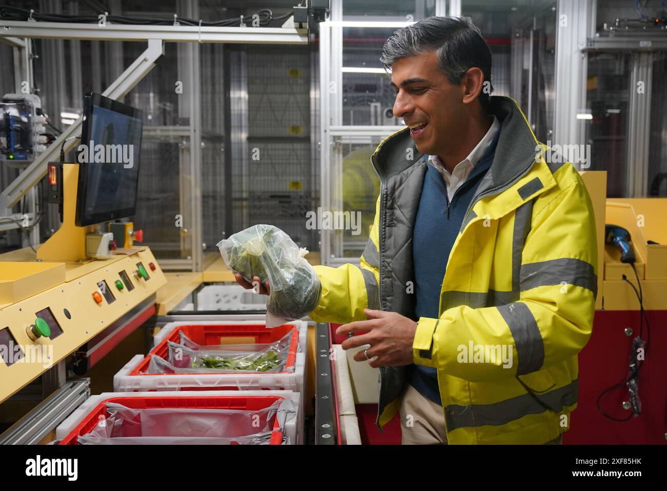 Prime Minister Rishi Sunak during a visit to an Ocado distribution ...