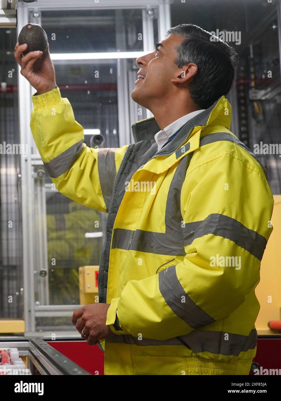 Prime Minister Rishi Sunak during a visit to an Ocado distribution ...