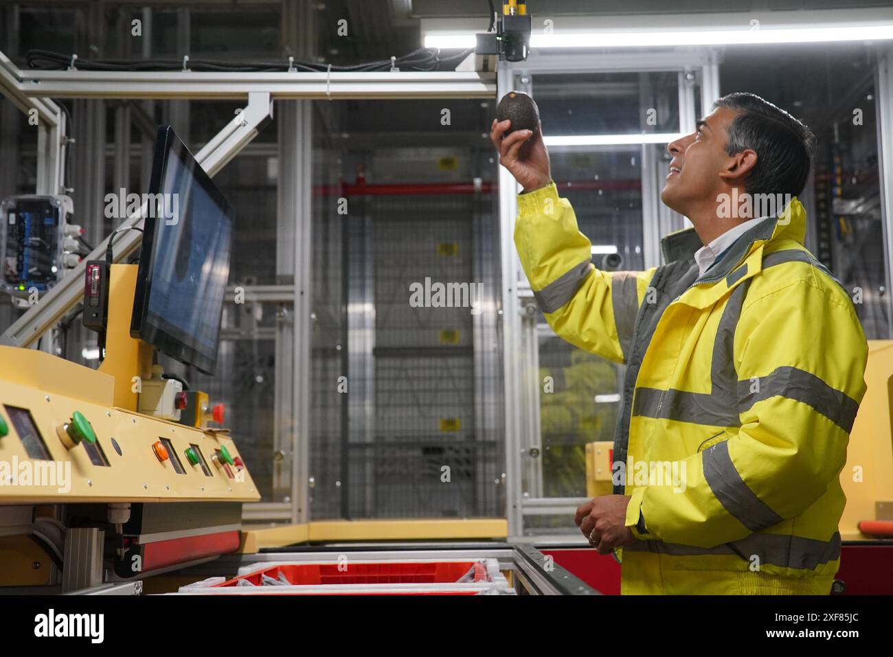 Prime Minister Rishi Sunak during a visit to an Ocado distribution ...