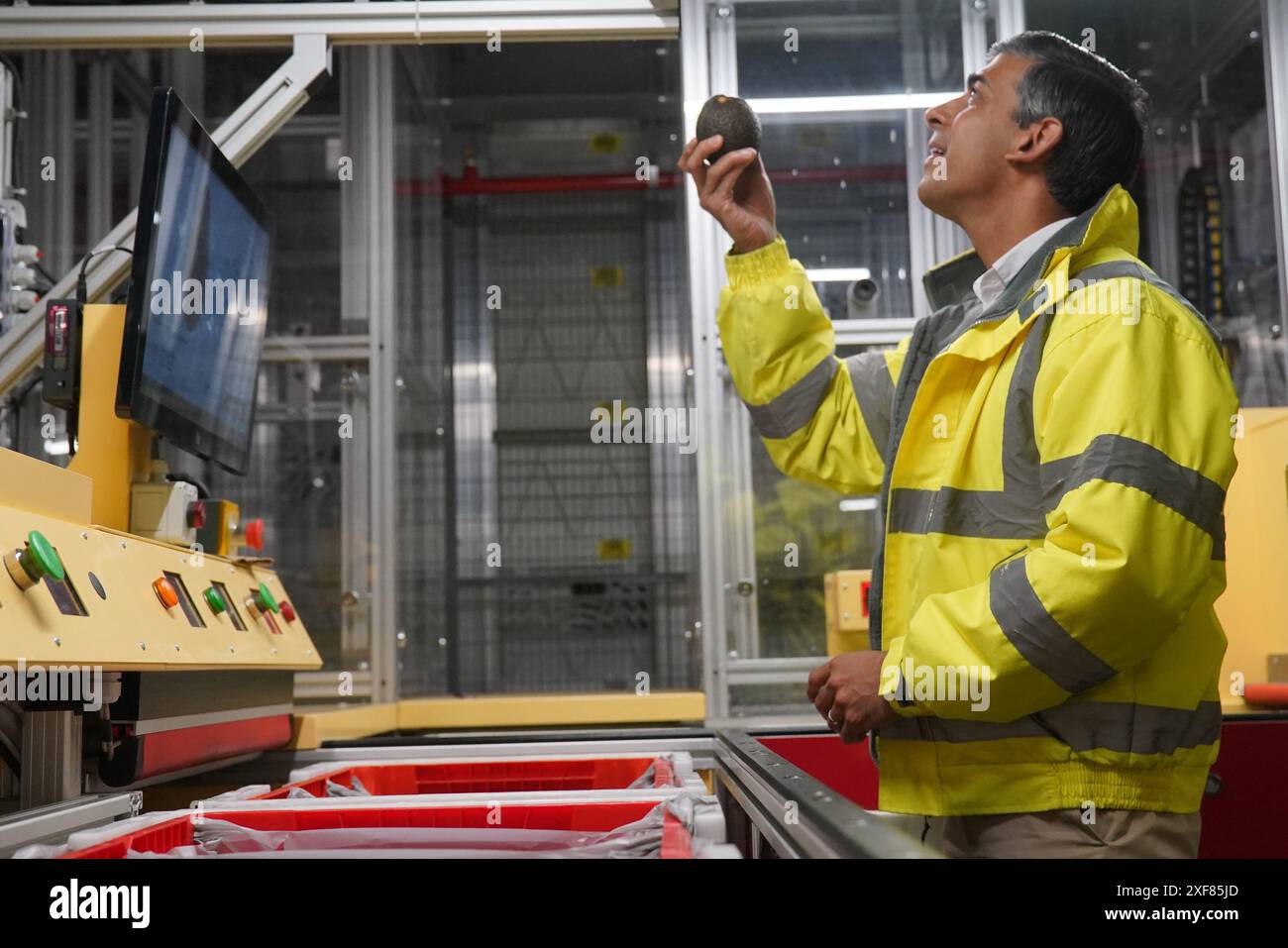 Prime Minister Rishi Sunak during a visit to an Ocado distribution ...