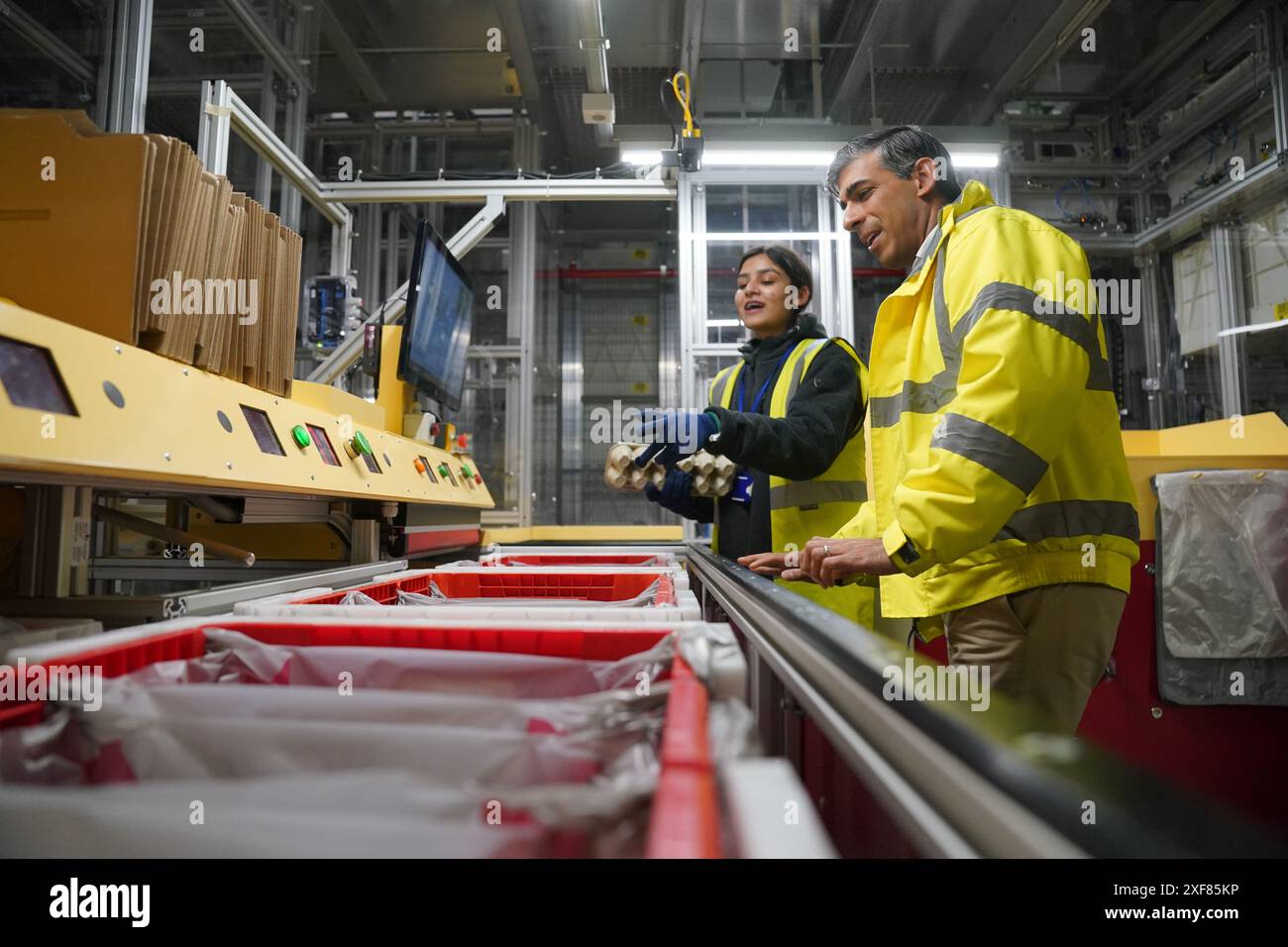 Prime Minister Rishi Sunak during a visit to an Ocado distribution ...