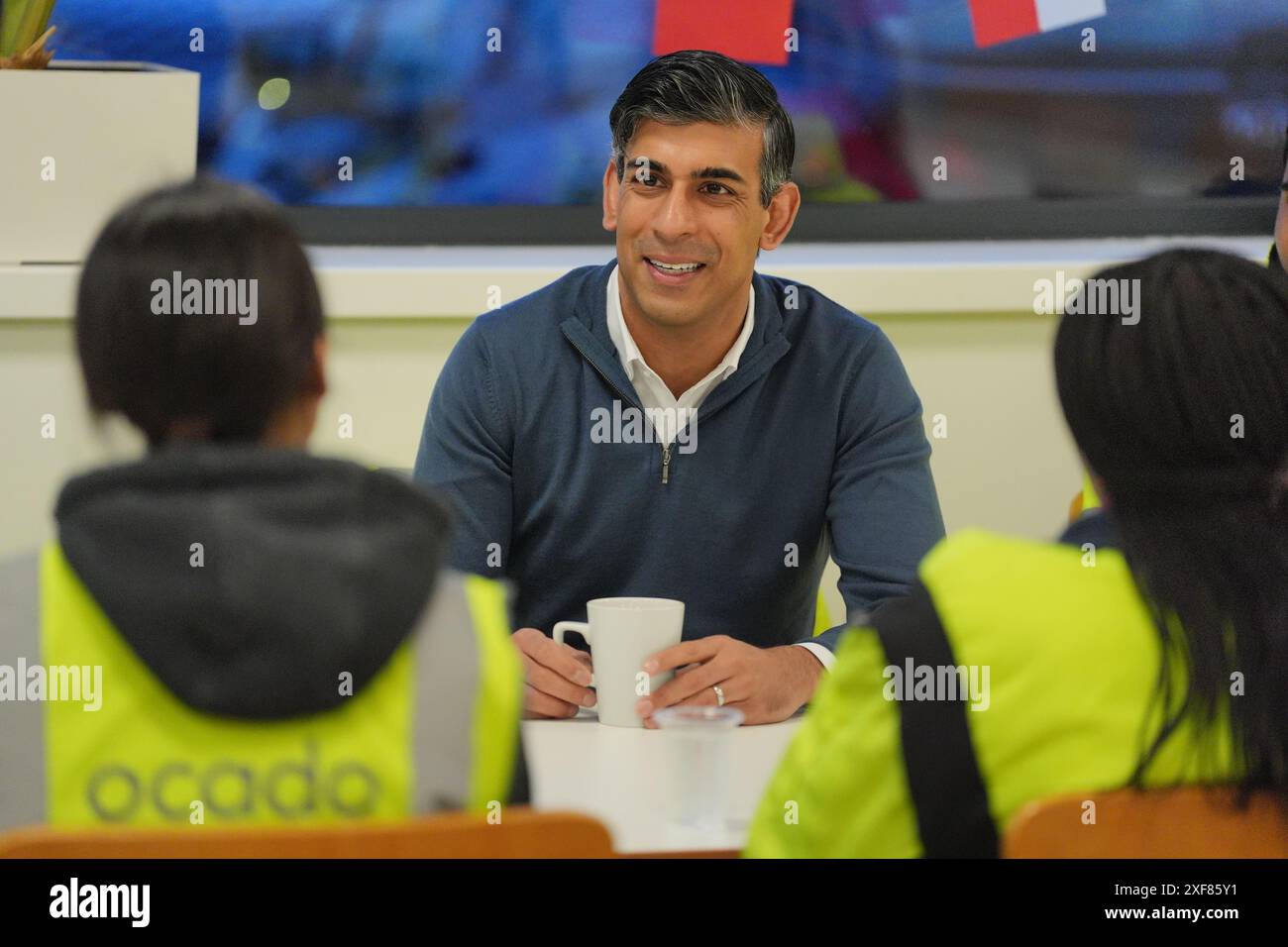 Prime Minister Rishi Sunak during a visit to an Ocado distribution ...