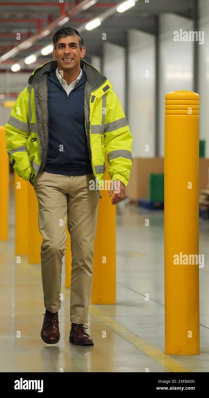 Prime Minister Rishi Sunak during a visit to an Ocado distribution ...