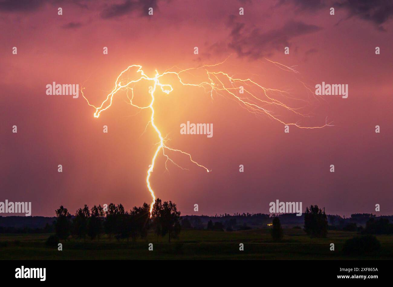 Dazzling lightning display brightening the nighttime with vibrant bolts ...
