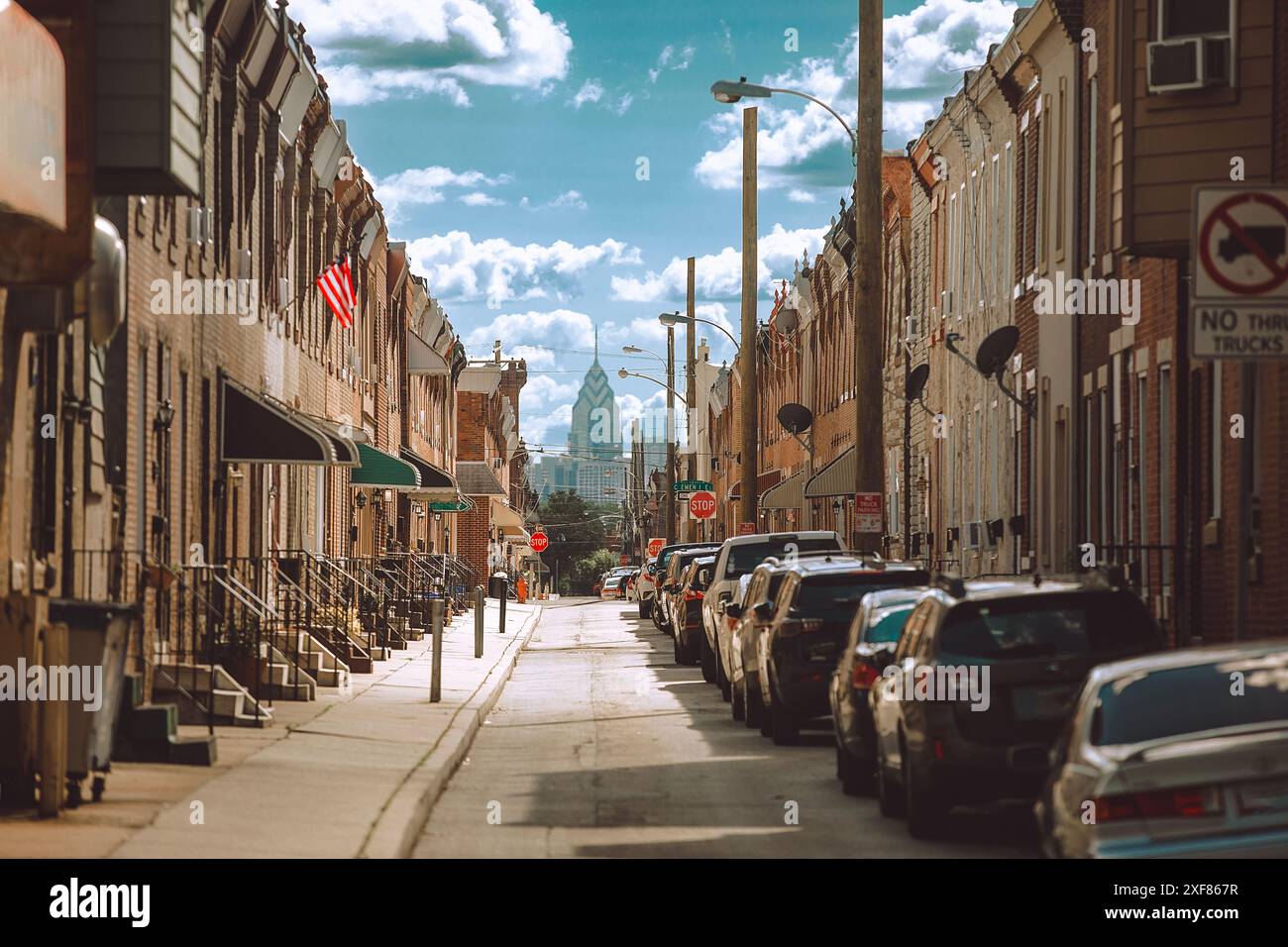 Cityscape with windows of houses against a blue sky with clouds in Port ...