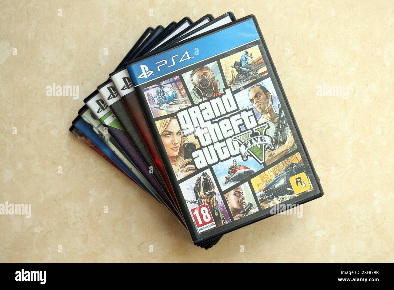 KYIV, UKRAINE - JUNE 26, 2024 Grand Theft Auto 5 PS4 video game disc ...