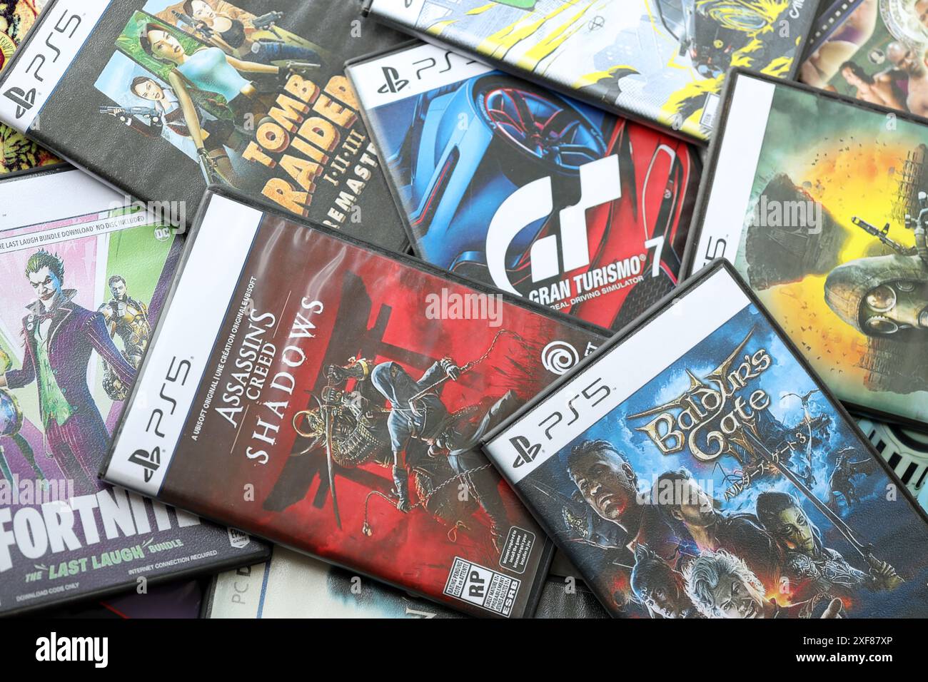 KYIV, UKRAINE - JUNE 26, 2024 Stack of video games for Sony Playstation ...