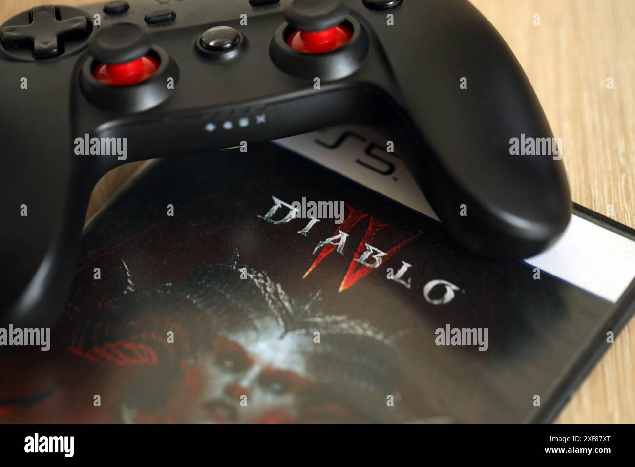 KYIV, UKRAINE - JUNE 26, 2024 Diablo 4 PS5 video game disc box for ...