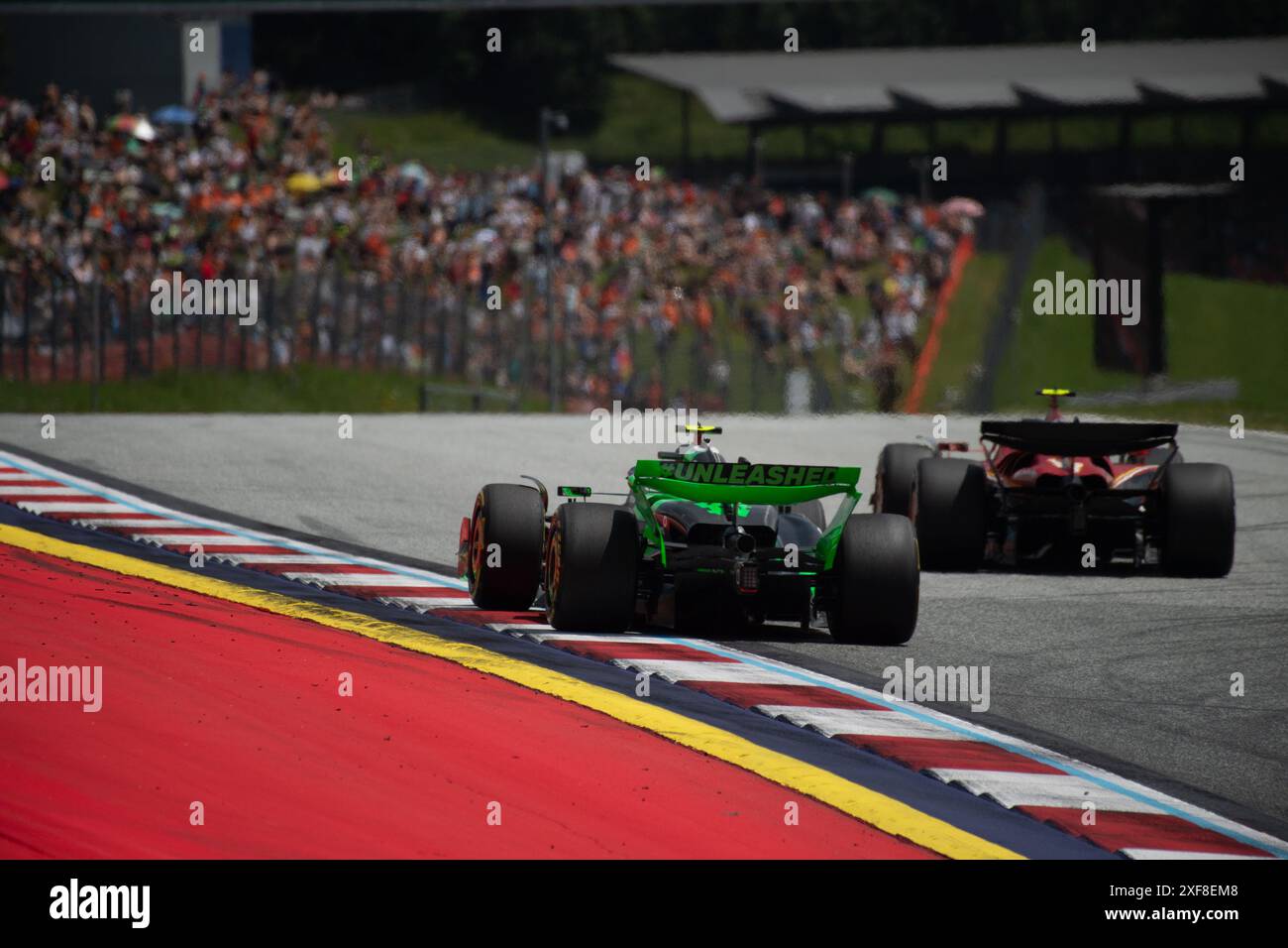 Spielberg/Austria - 28 JUNE 2024, #24 Guanyu Zhou (CHI, Stake F1), #55 ...