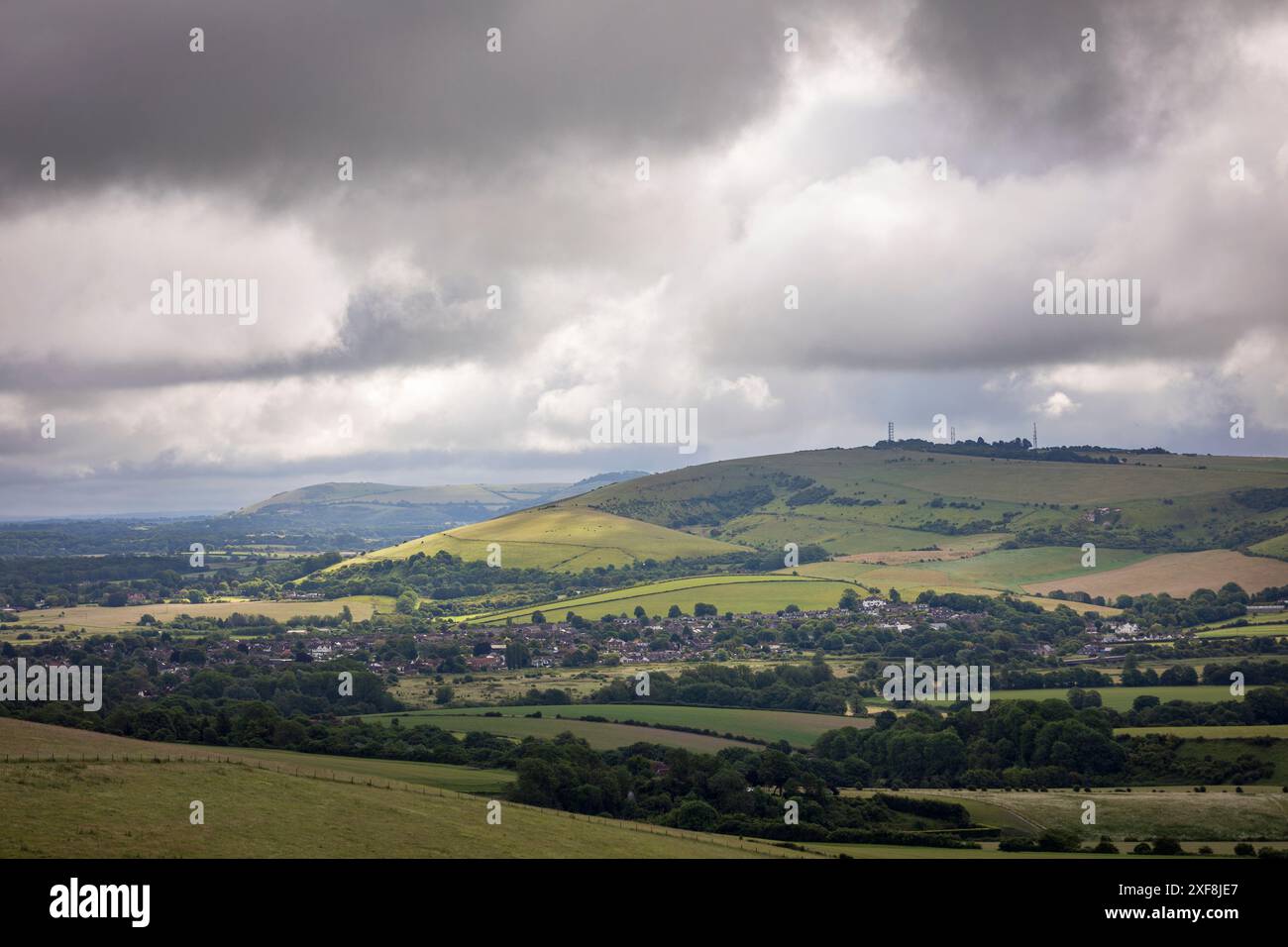 Moody cloudy skies above the south downs in west Sussex from Steyning ...
