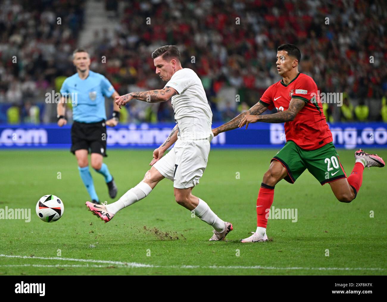 Frankfurt, Germany. 1st July, 2024. Benjamin Verbic (C) of Slovenia ...