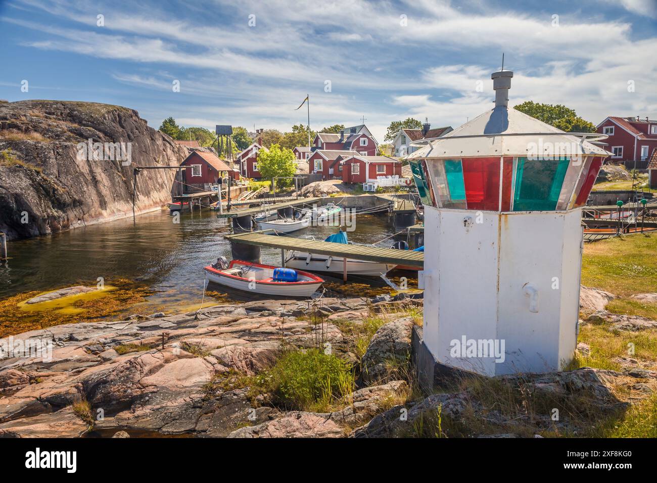 Lighthouse and small port hi-res stock photography and images - Alamy