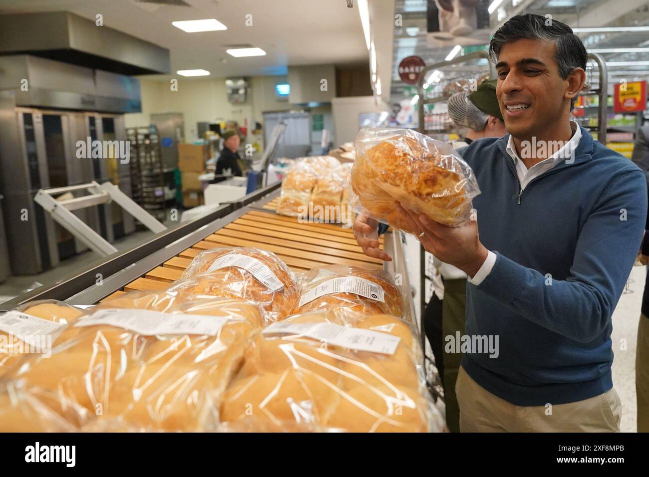 Prime Minister Rishi Sunak at a bakery during a visit to a Morrisons ...