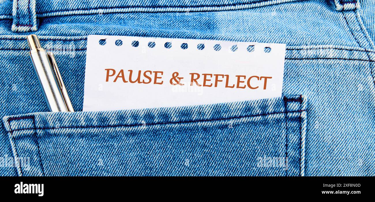 Conceptual pause and reflect symbol. Pause and reflect words written on ...