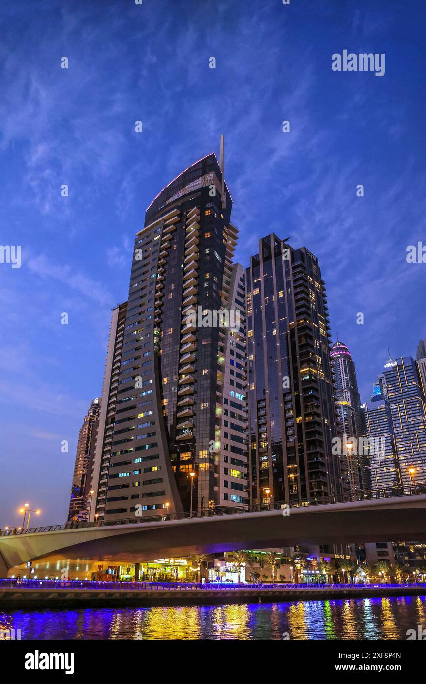 Dubai, UAE - February 23. 2023: Dubai high-rise buildings during blue ...