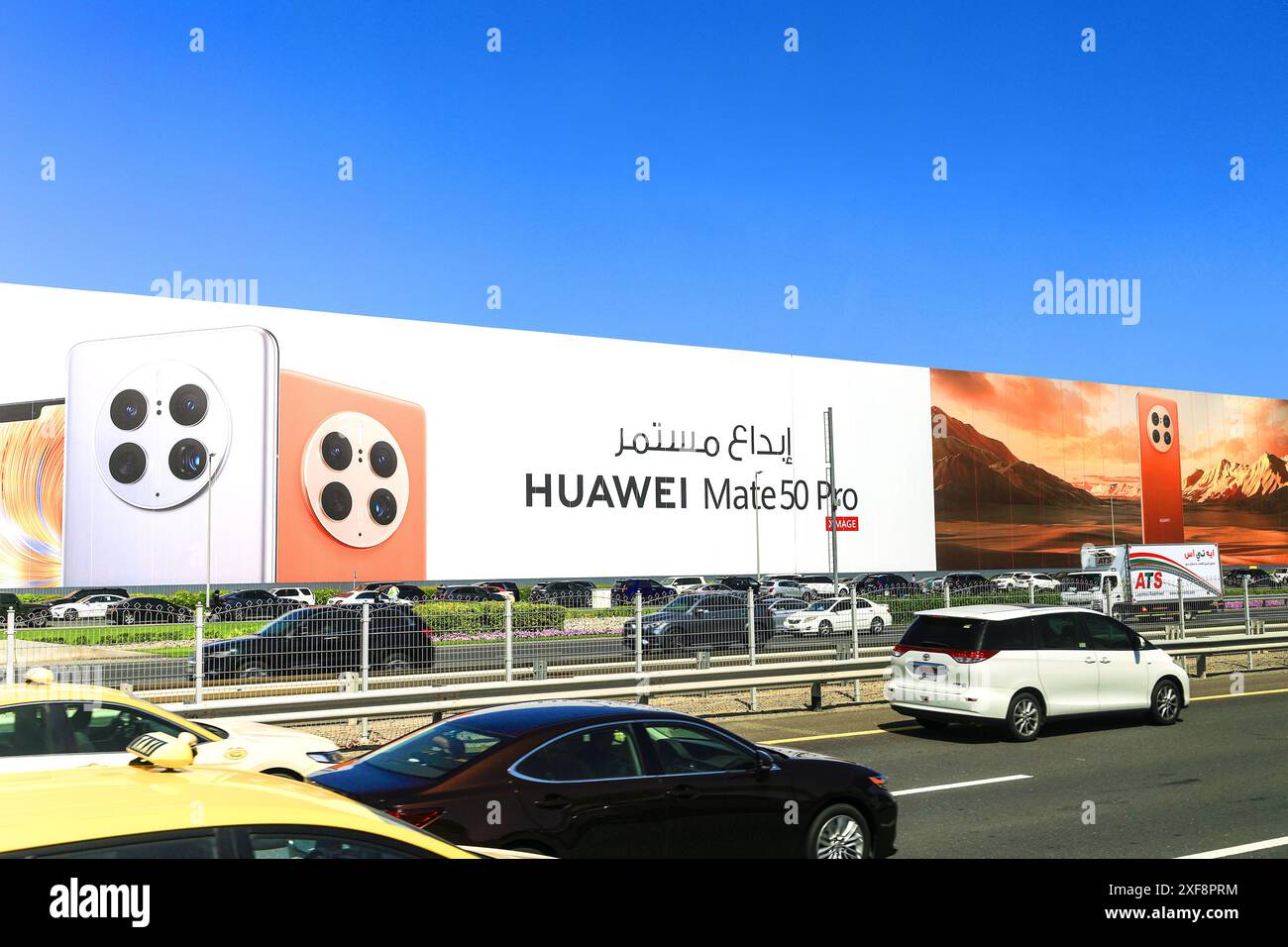 Dubai, UAE - February 24. 2023: Huge billboard of Huawai commercial ...